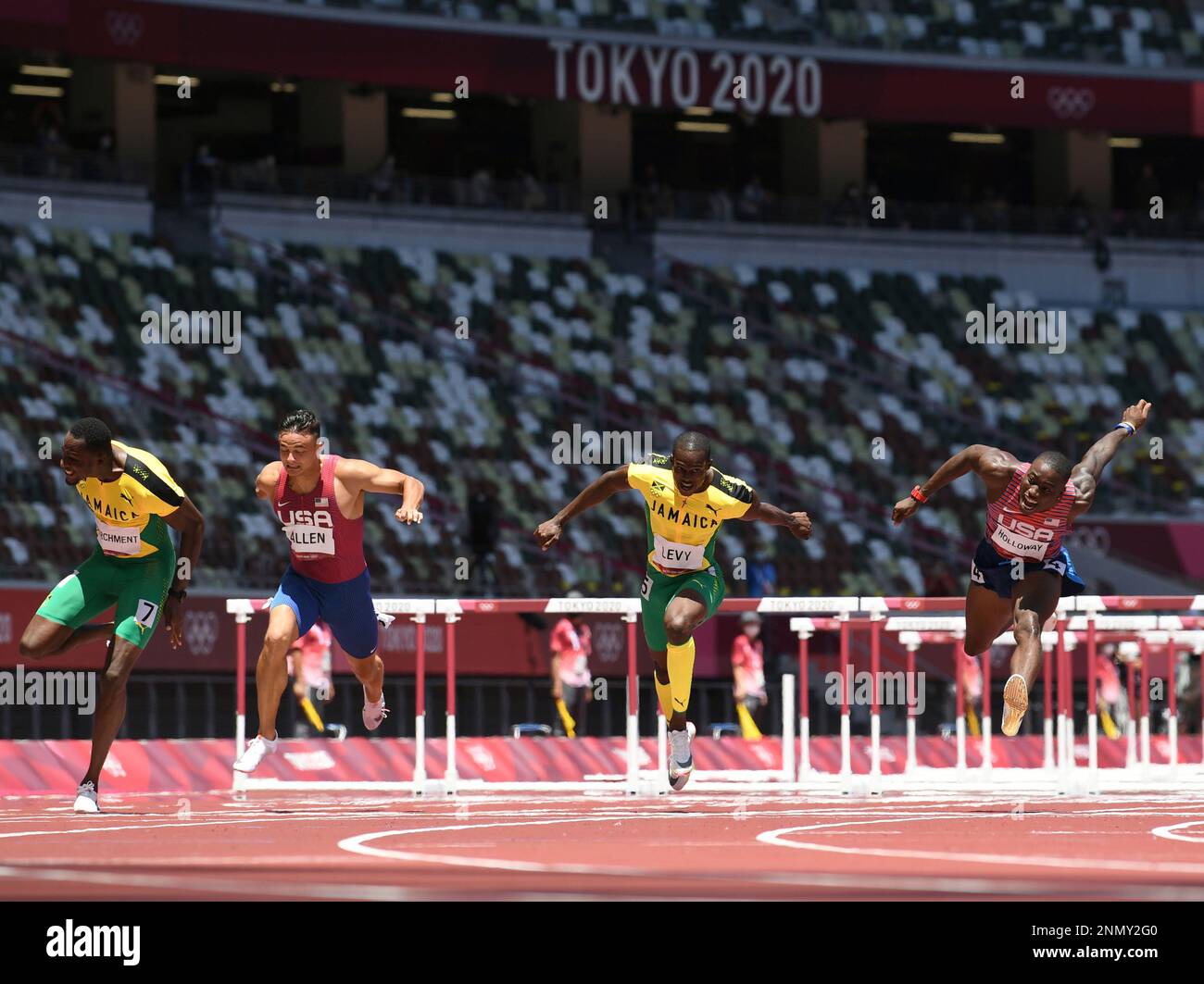 PARCHMENT Hansle (L, 7) of Jamaica crosses the finish line during the ...