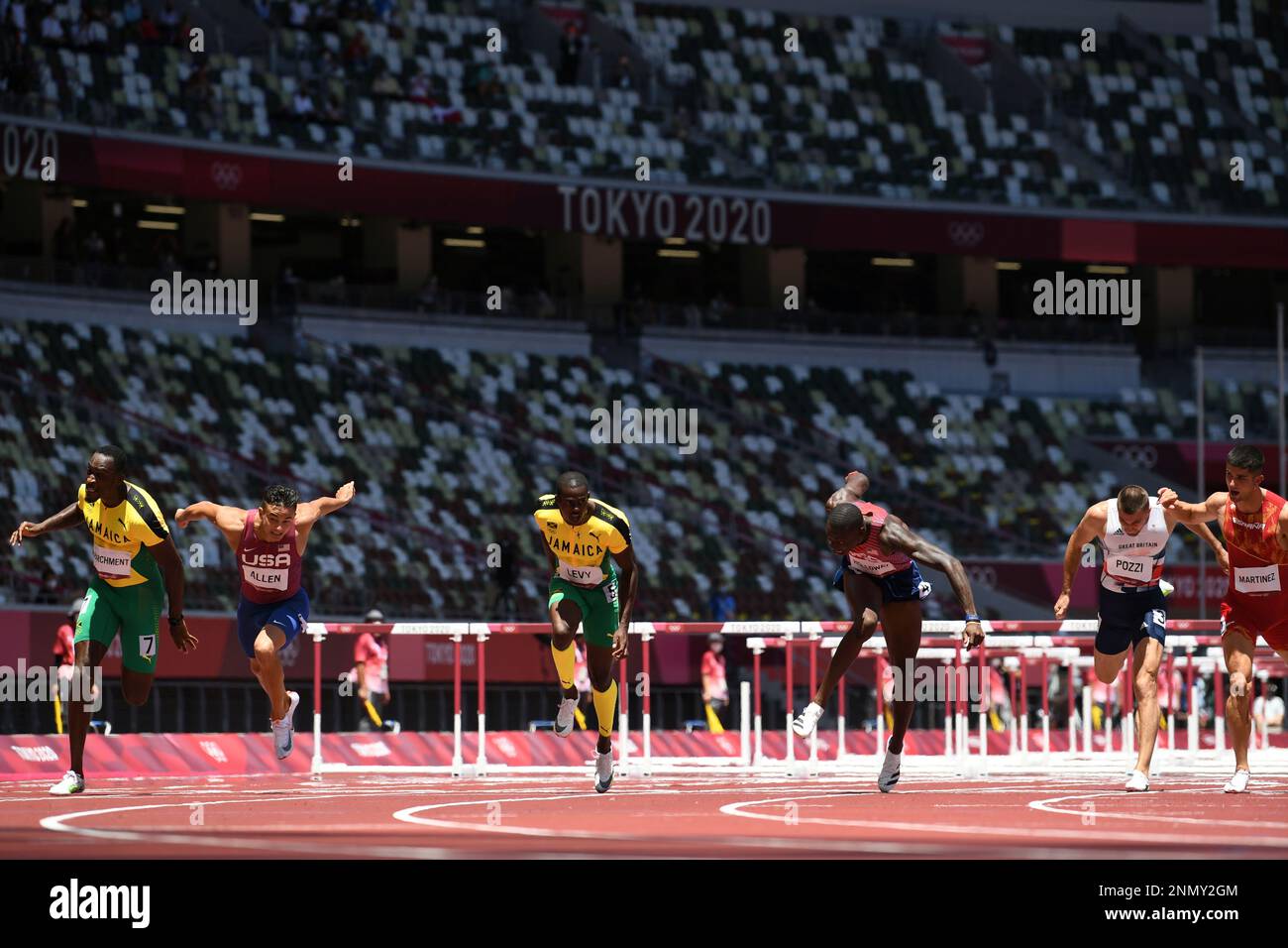 PARCHMENT Hansle (L, 7) of Jamaica crosses the finish line during the ...