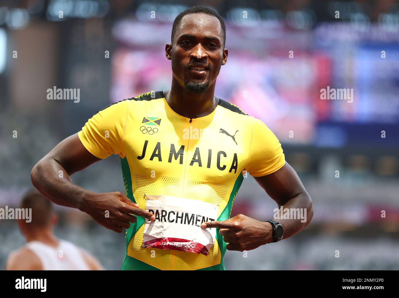 PARCHMENT Hansle (7) of Jamaica ponits out his name after winning the ...