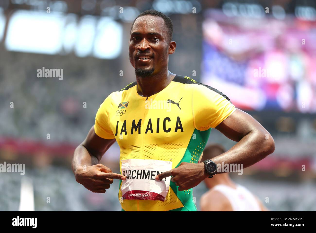 PARCHMENT Hansle (7) of Jamaica ponits out his name after winning the ...
