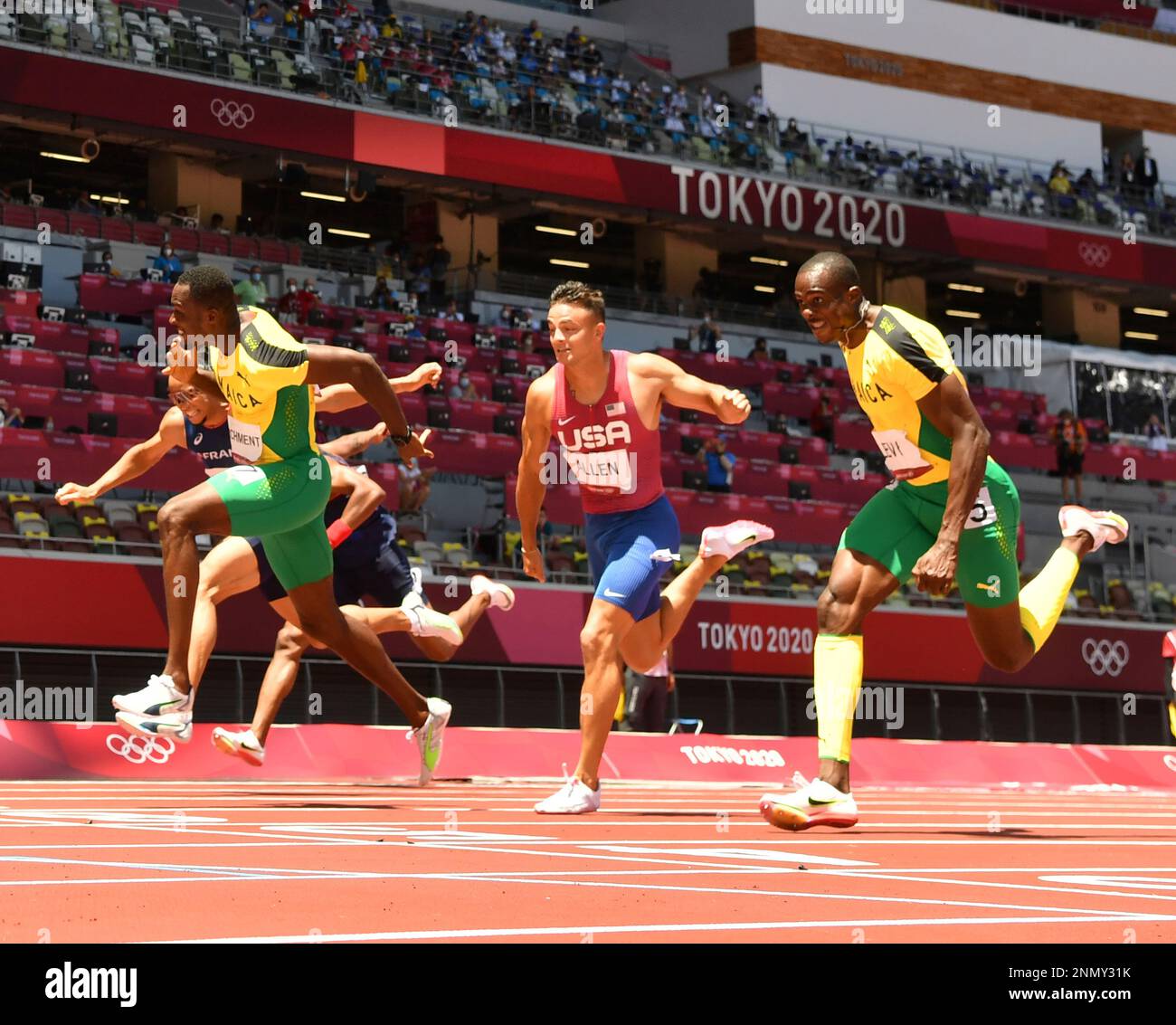 PARCHMENT Hansle (2nd from L, 7) of Jamaica crosses the finish line ...