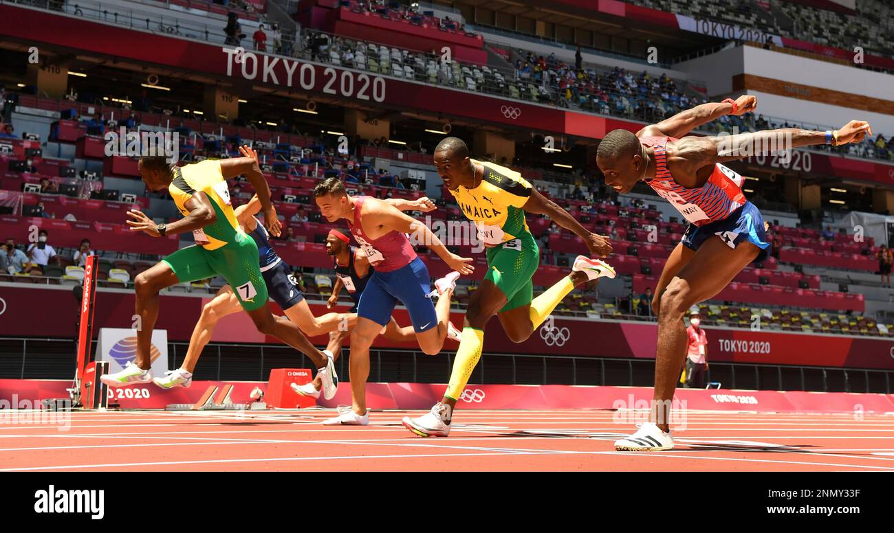 PARCHMENT Hansle (L, 7) of Jamaica crosses the finish line during the ...