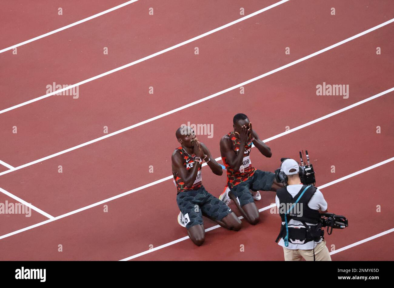 Kenya's KORIR Emmanuel Kipkurui(R) celebrates with ROTICH Ferguson ...