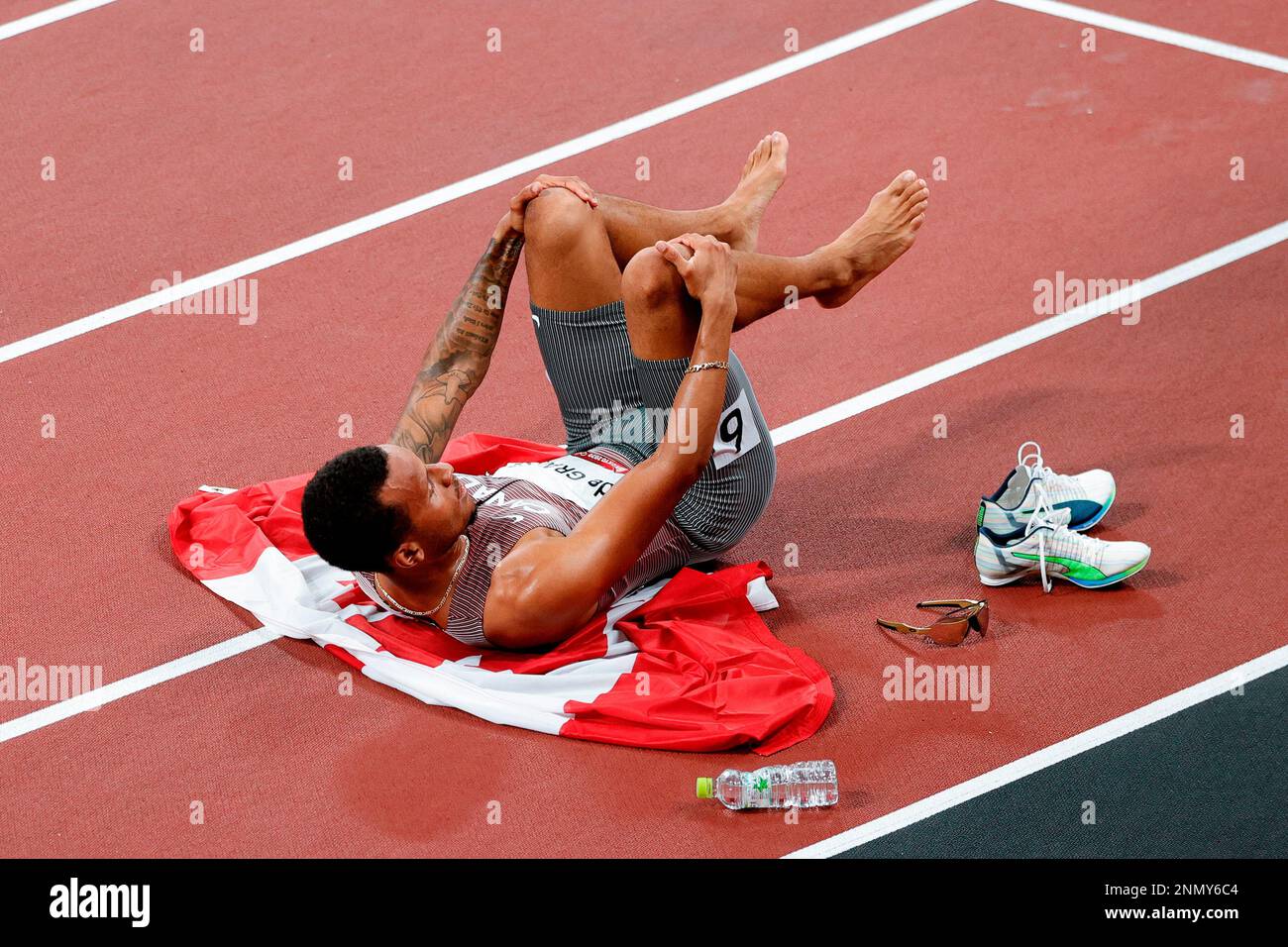 TOKYO, JAPAN - AUGUST 04: Andre De Grasse of Team Canada celebrates ...