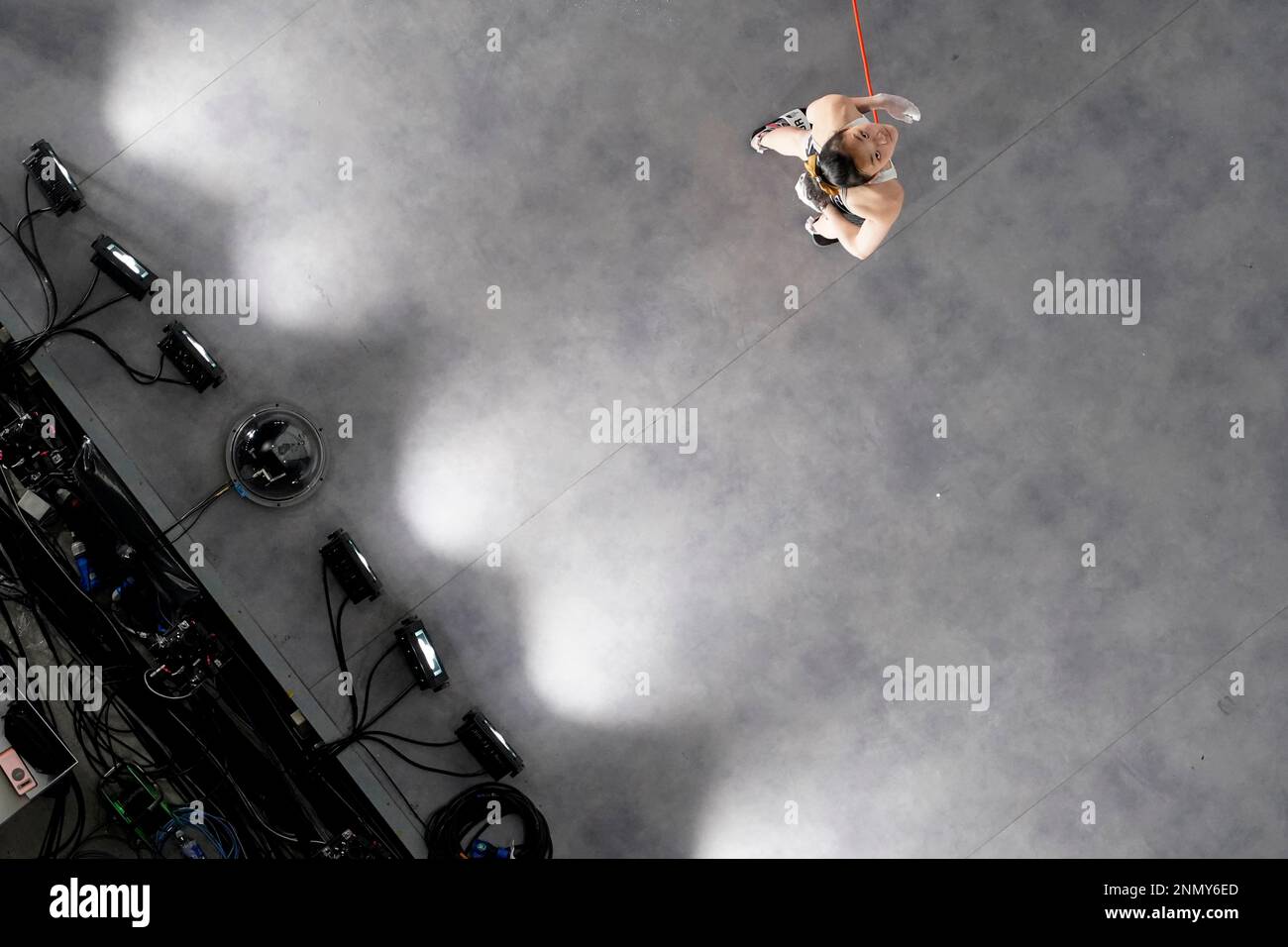 Seo Chae-hyun, of South Korea, looks up as she prepares to climb during ...