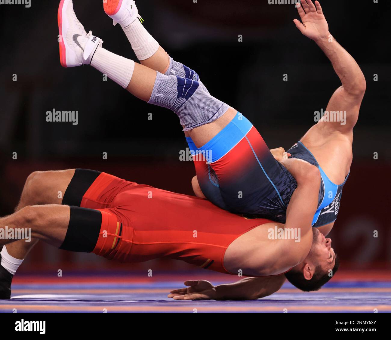 KUDLA Denis Maksymilian (below, red) throws METWALLY Mohamed of Egypt ...