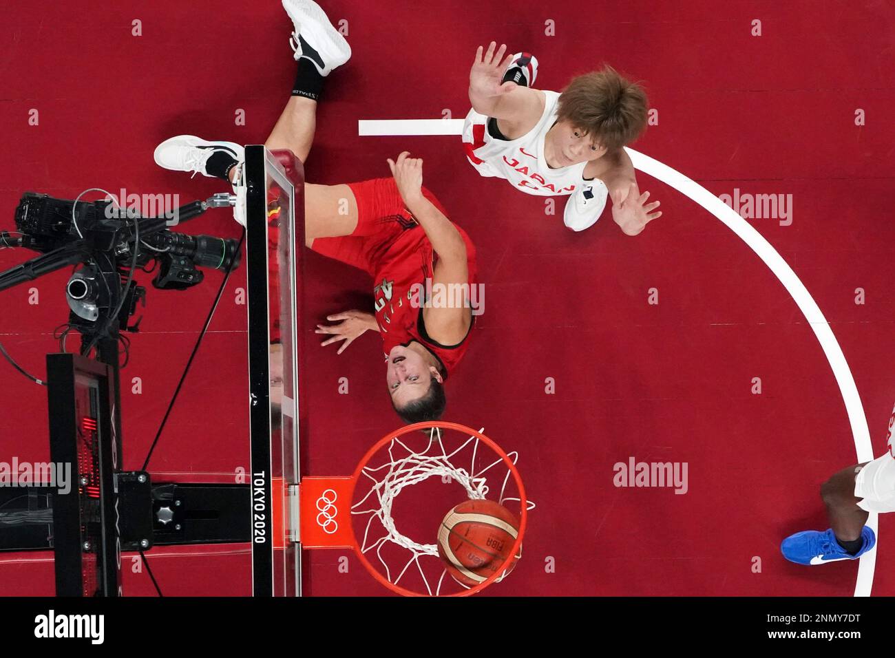 Belgium's Jana Raman (42) scores ahead of Japan's Maki Takada, right ...