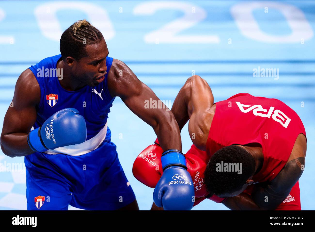 TOKYO, JAPAN - AUGUST 03: Abner Teixeira of Team Brazil and Julio La Cruz of Team Cuba in action ...