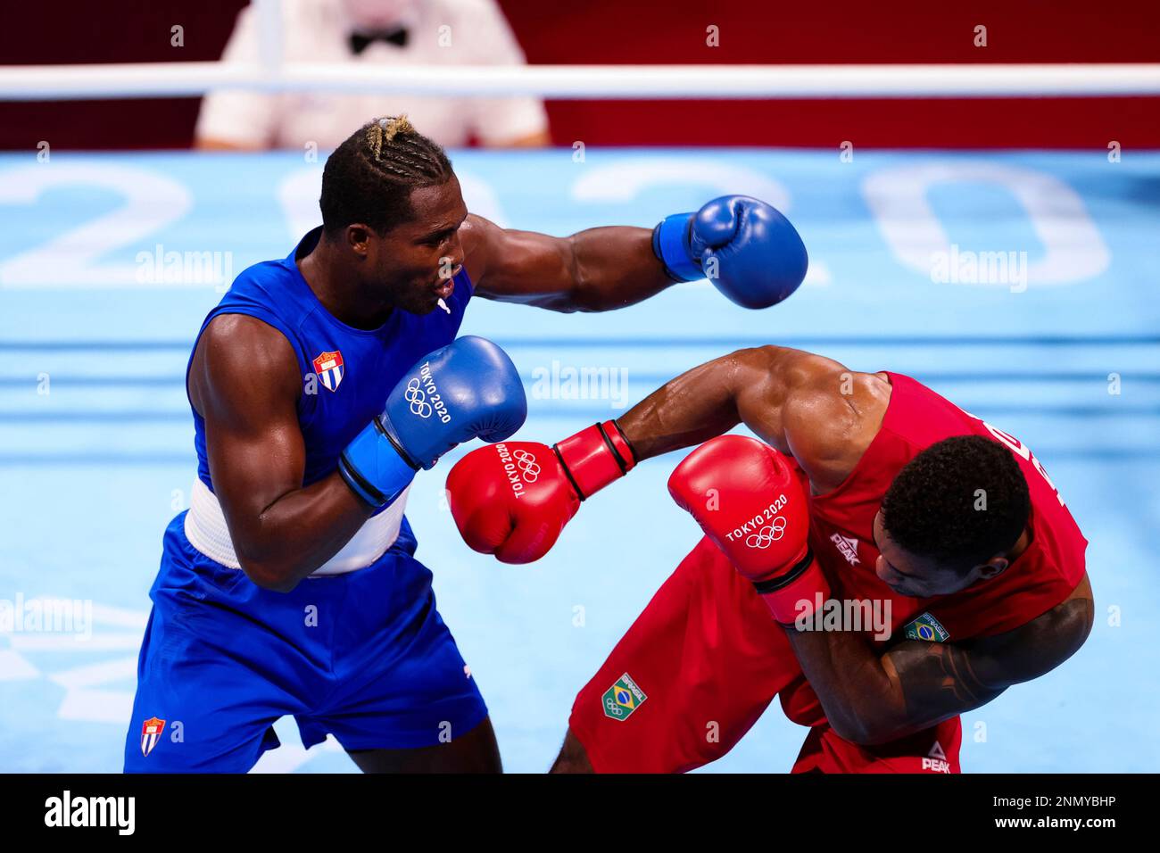 TOKYO, JAPAN - AUGUST 03: Abner Teixeira of Team Brazil and Julio La Cruz of Team Cuba in action ...