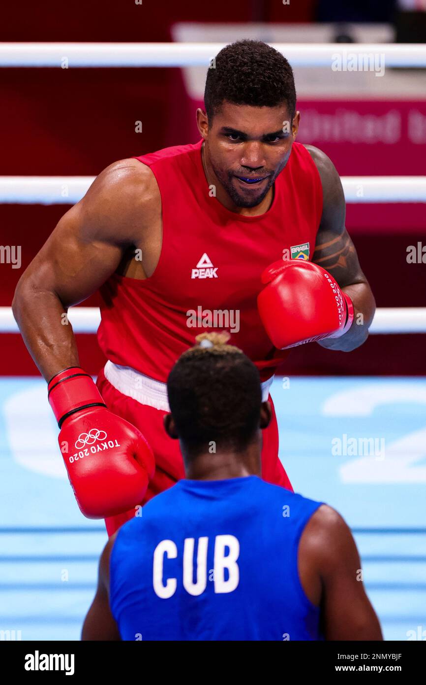 TOKYO, JAPAN - AUGUST 03: Abner Teixeira of Team Brazil and Julio La Cruz of Team Cuba in action ...