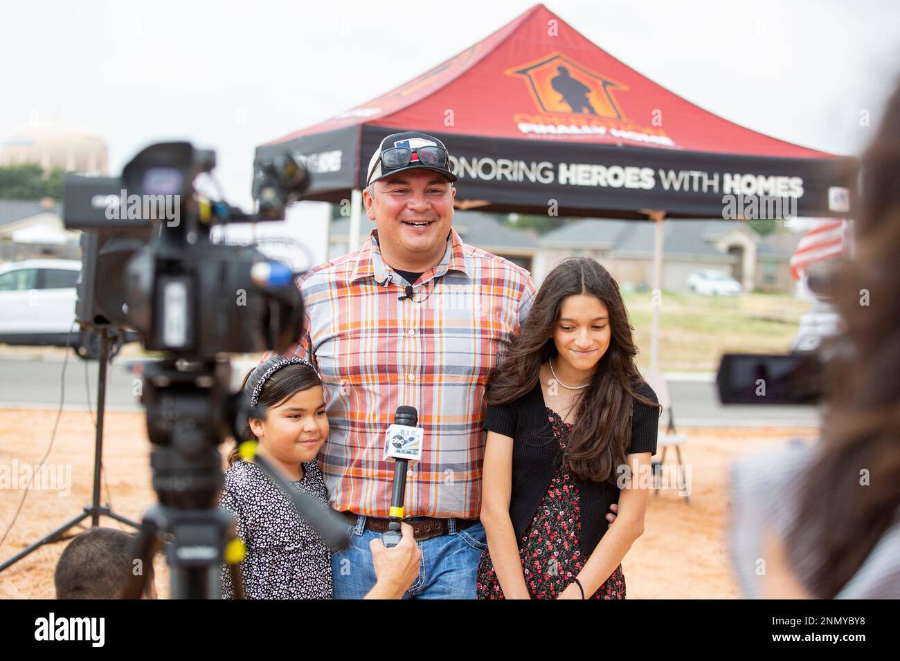 United States Marine Corps veteran Ray Lopez speaks with the media at a ...