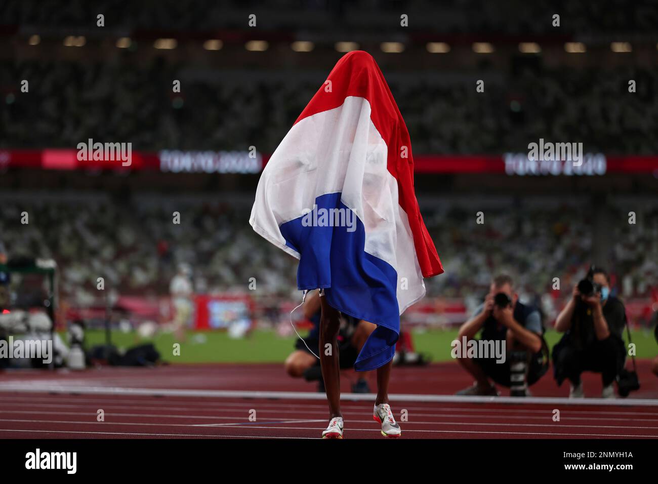 Netherlands' HASSAN Sifan celebrates after winning the Women's 5000m ...