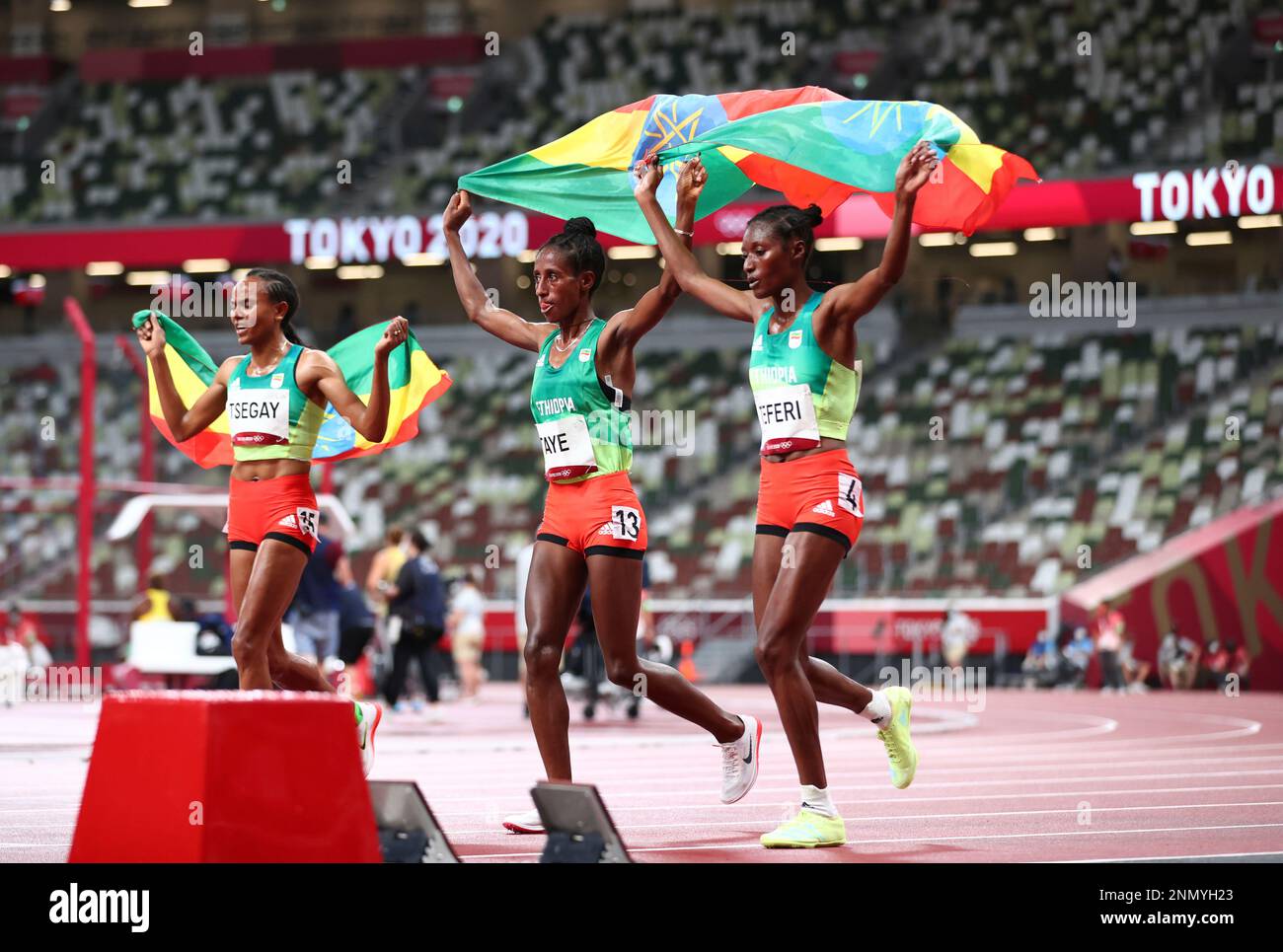 (L to R) Ethiopia's TEFERI Senbere,TSEGAY Gudaf and TAYE Ejgayehu hold ...