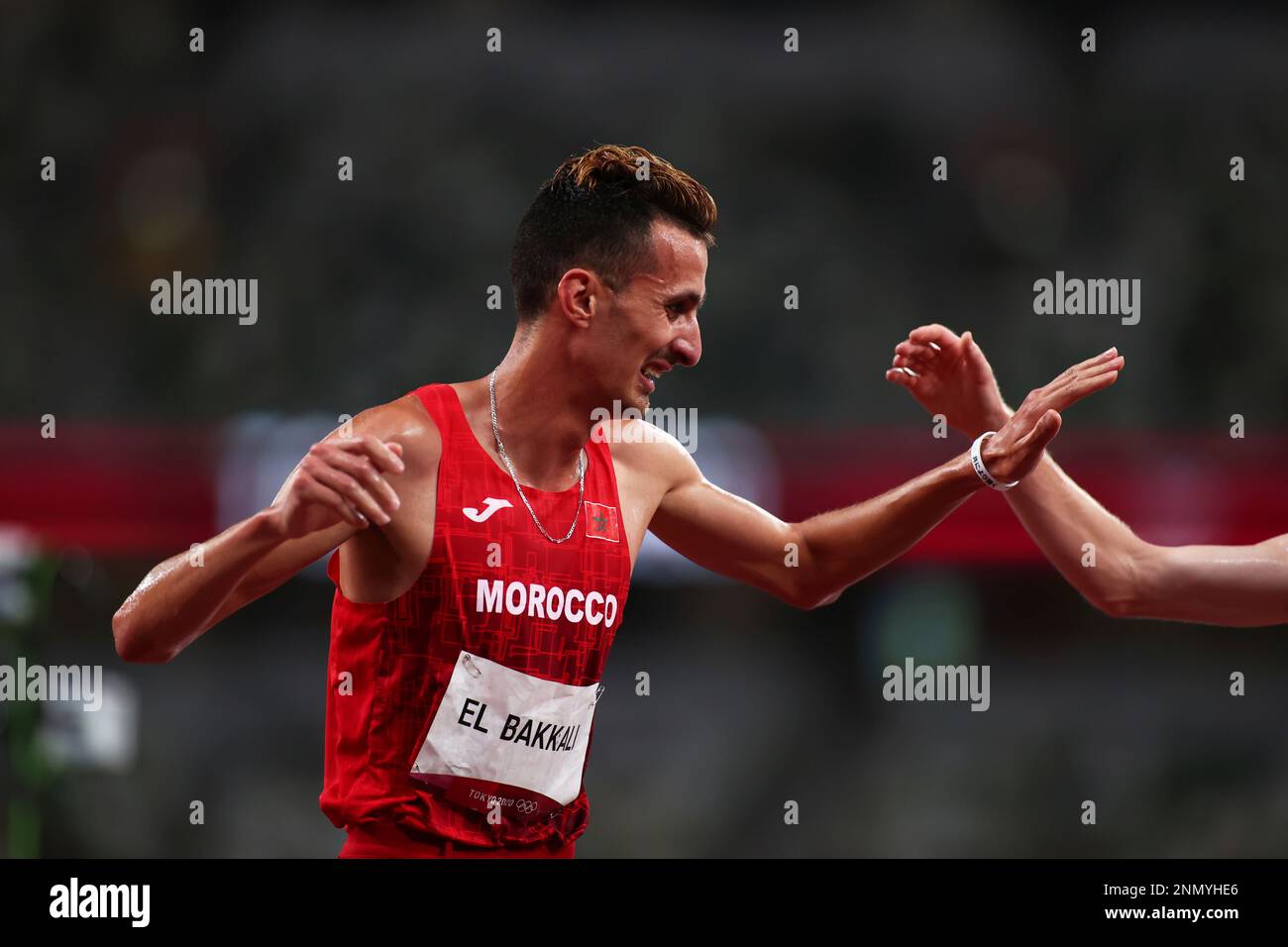 Morocco's EL BAKKALI Soufiane reacts after winning the Men's 3000m ...