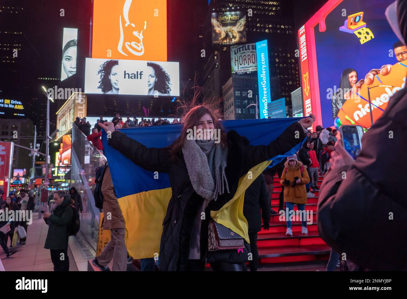NEW YORK, NEW YORK - FEBRUARY 24: Woman with a Ukrainian flag poses ...