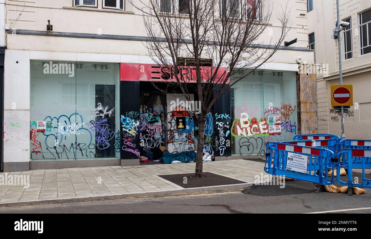 Brighton UK 25th February 2023 - People sleeping rough in shop doorway ...