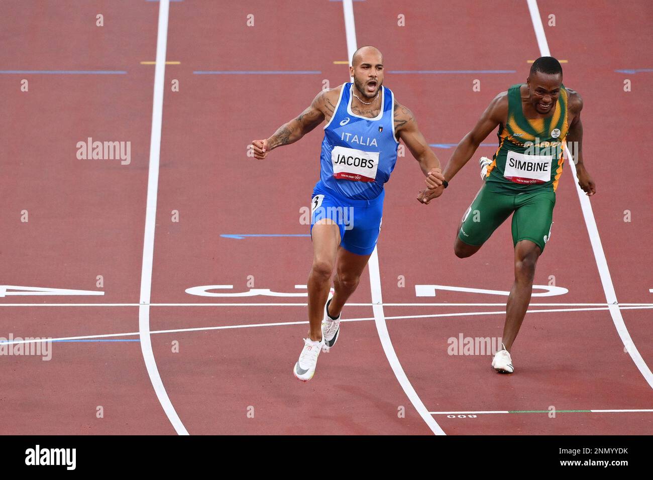 Lamont Marcell Jacobs, of Italy, celebrates after winning the final of ...