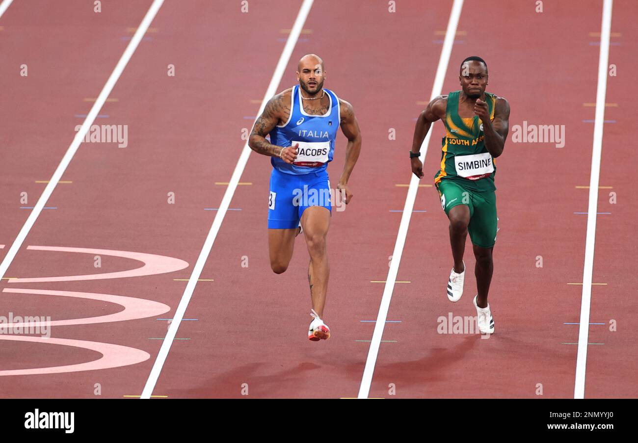 JACOBS Lamont Marcell of Italy (L) competes during Athletics men's 100m ...