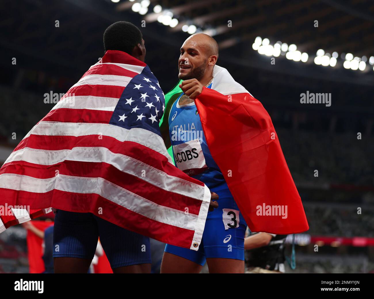 Italy's JACOBS Lamont Marcell(R) celebrates with USA's KERLEY Fred ...