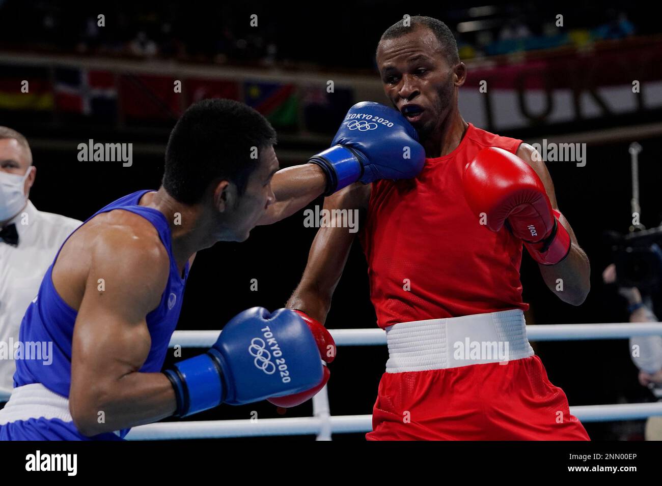 Cuba's Lazaro Alvarez, right, exchanges punches with Thailand's ...