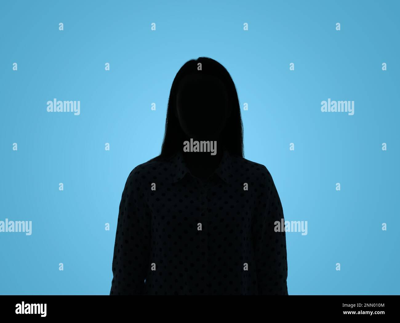 Silhouette of anonymous woman on light blue background Stock Photo - Alamy