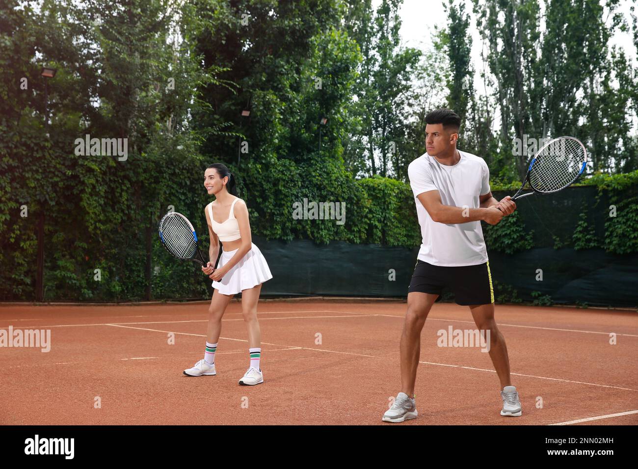 Man woman fun tennis hi-res stock photography and images - Alamy