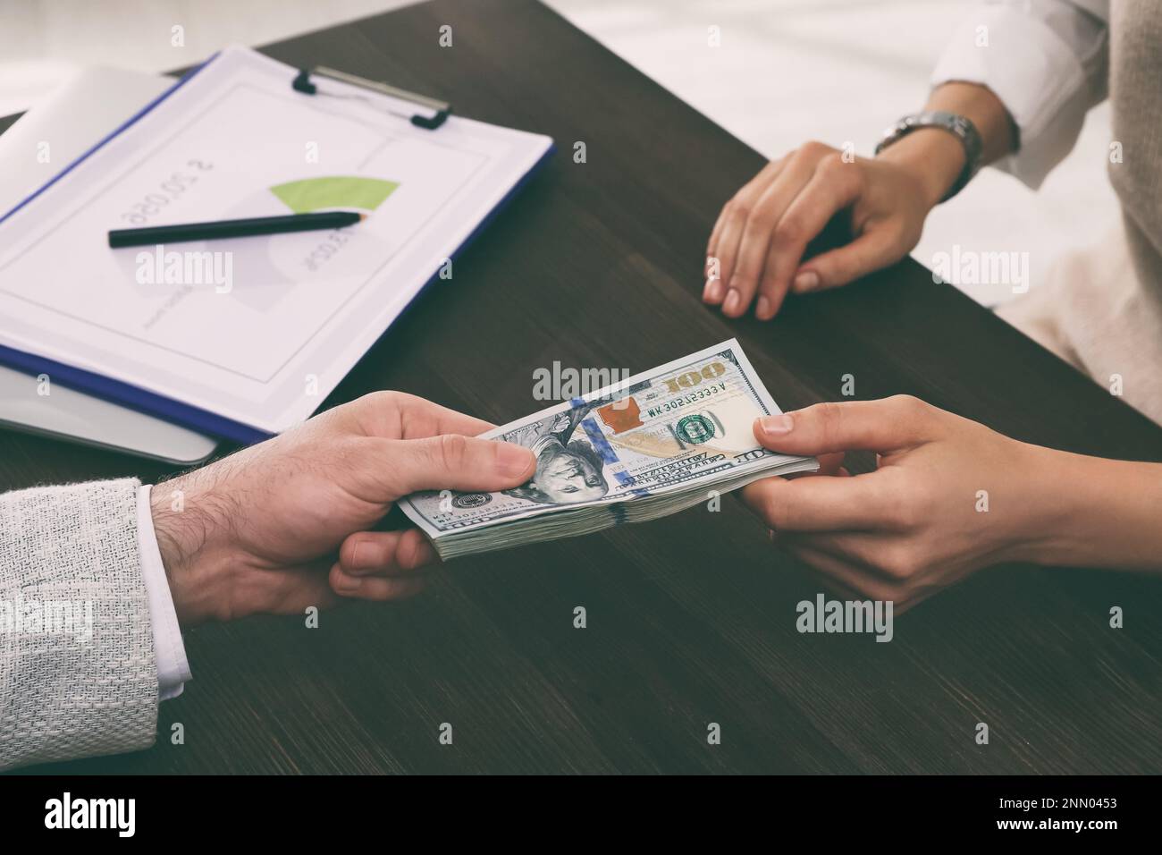 Bank cashier giving money hi-res stock photography and images - Alamy
