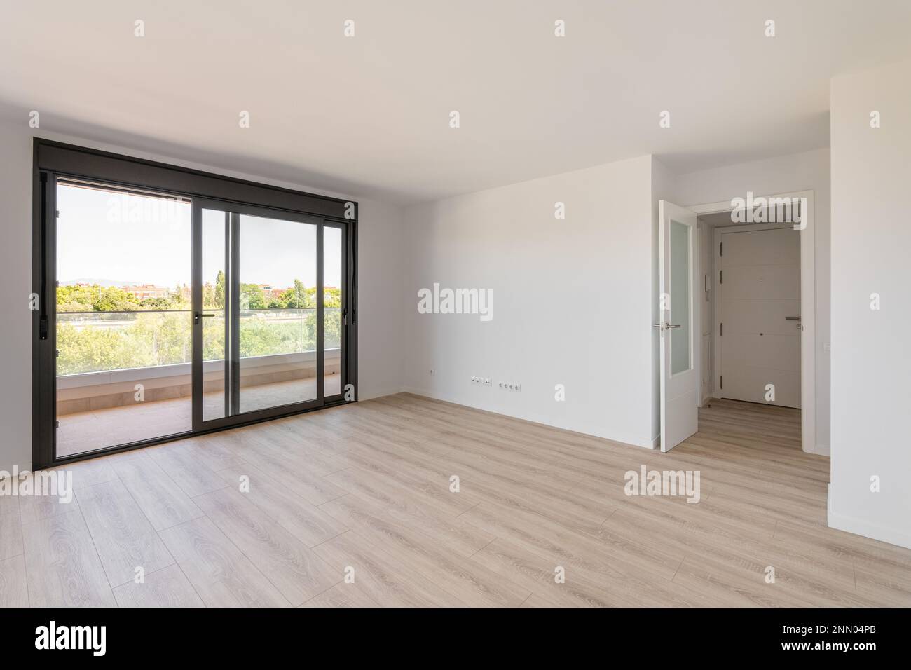 Spacious large room with wooden parquet structure and panoramic window ...