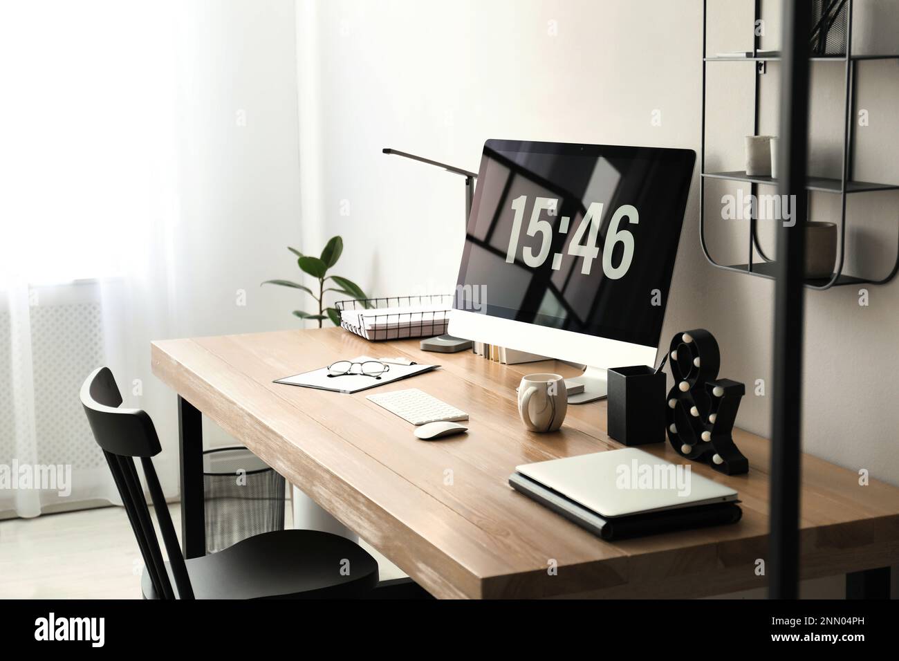 Modern workplace with computer in room. Interior design Stock Photo - Alamy