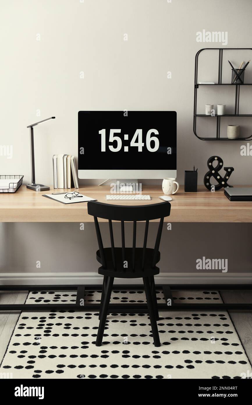 Modern workplace with computer in room. Interior design Stock Photo - Alamy