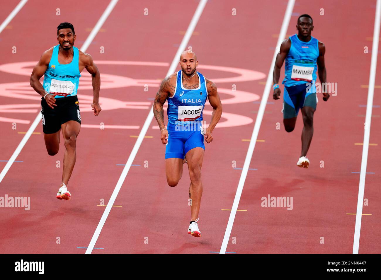 TOKYO, JAPAN - JULY 31: Lamont Marcell Jacobs of Team Italy wins his ...