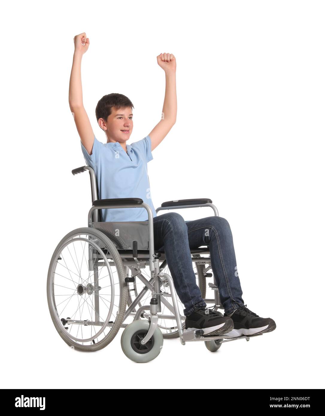Teenage boy in wheelchair on white background Stock Photo - Alamy