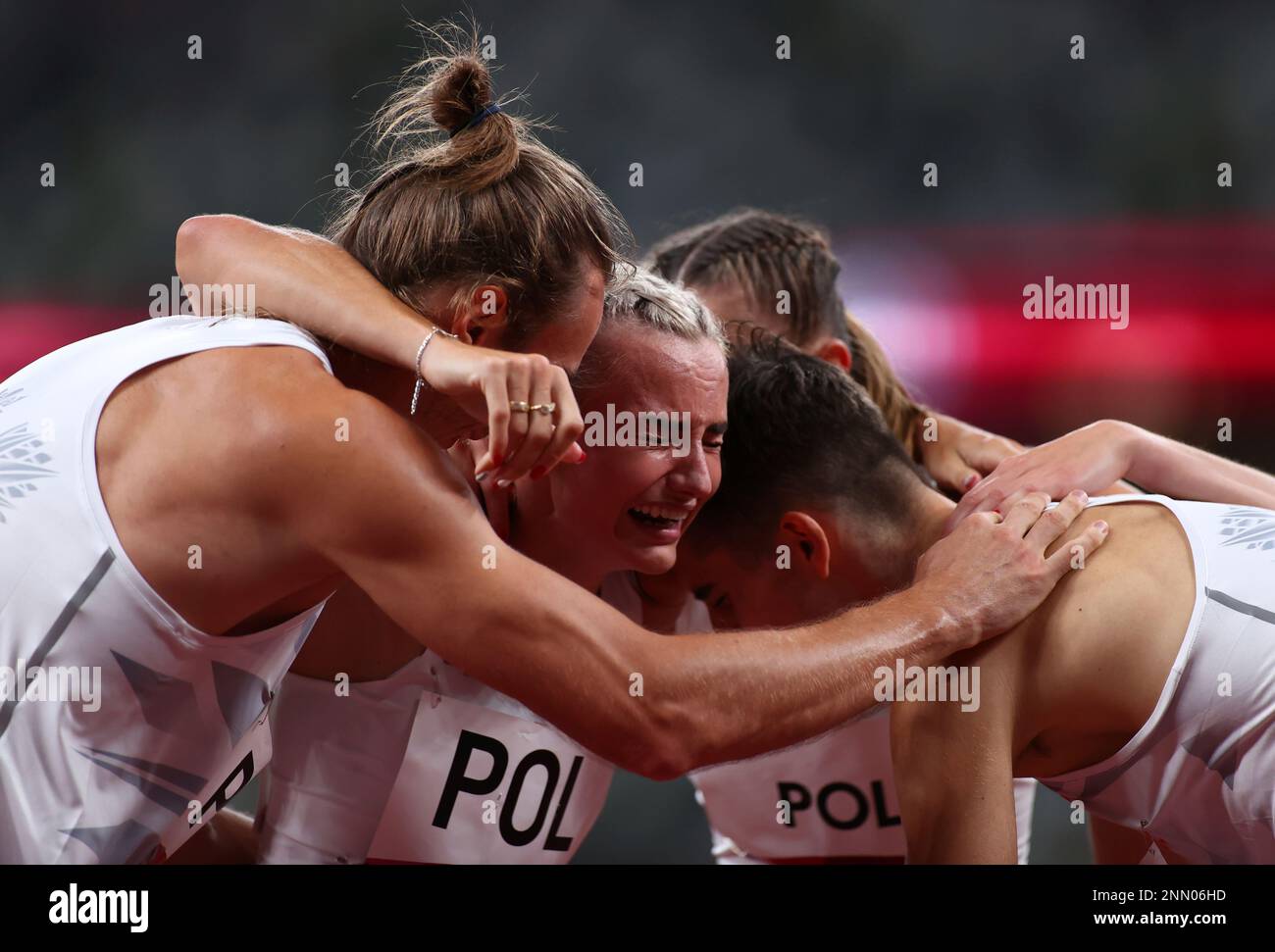 Poland's team members celebrate after winning the 4 x 400m Relay Mixed ...