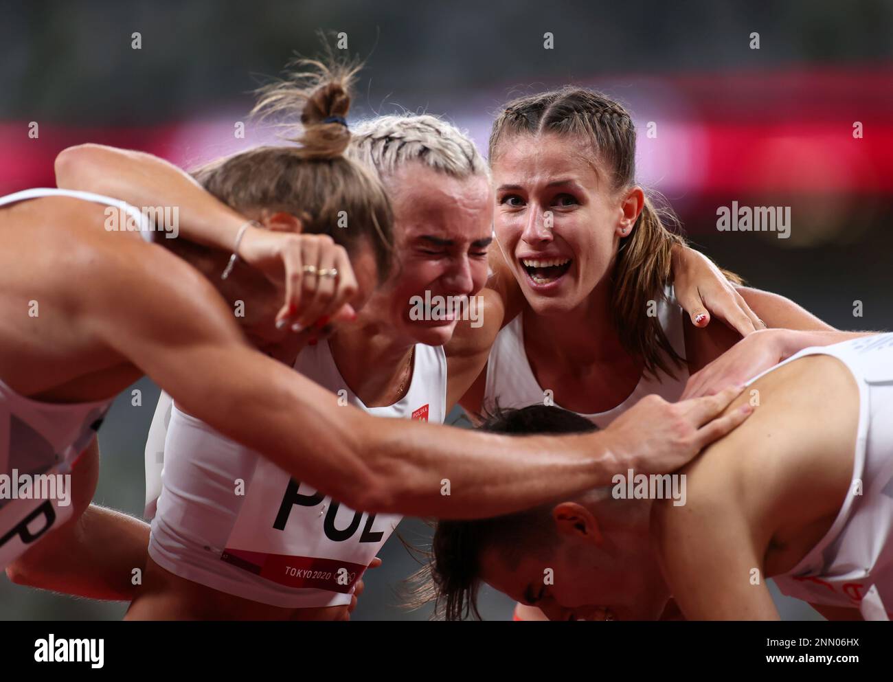 Poland's team members celebrate after winning the 4 x 400m Relay Mixed ...