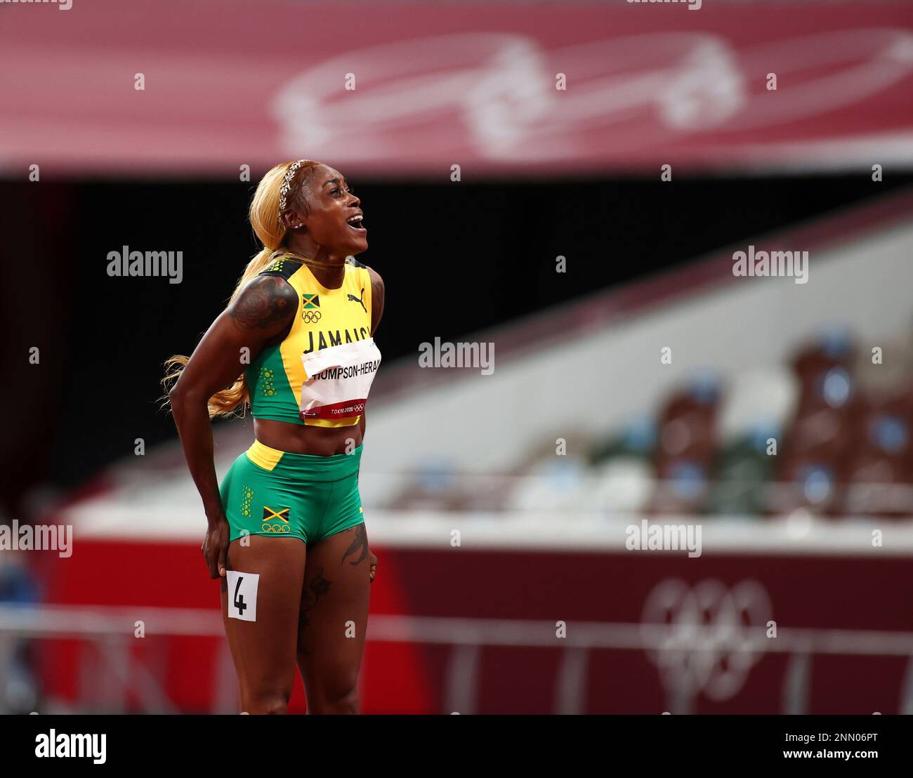 THOMPSON-HERAH Elaine of Jamaica reacts after winning Athletics women's ...