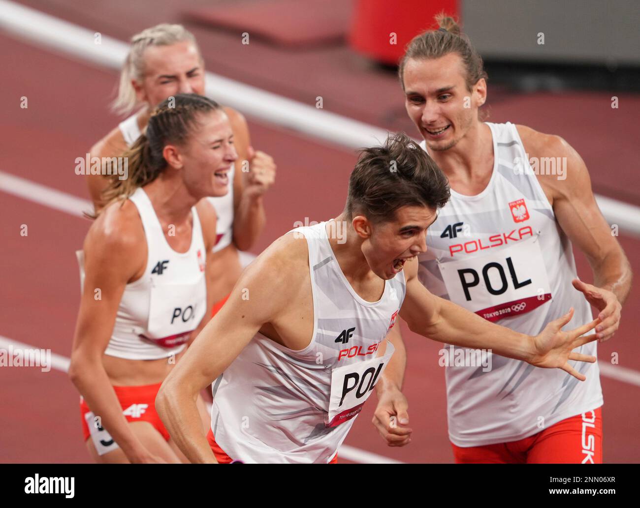 Poland's team members celebrate after winning the 4 x 400m Relay Mixed ...