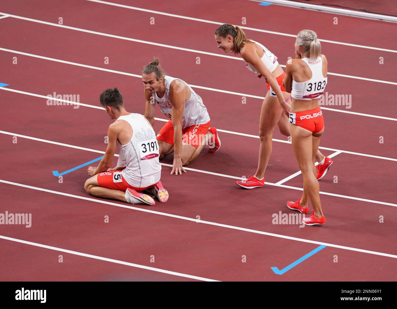 Poland's team members celebrate after winning the 4 x 400m Relay Mixed ...