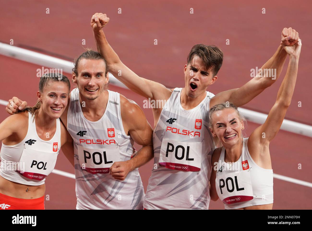 Poland's team members celebrate after winning the 4 x 400m Relay Mixed ...