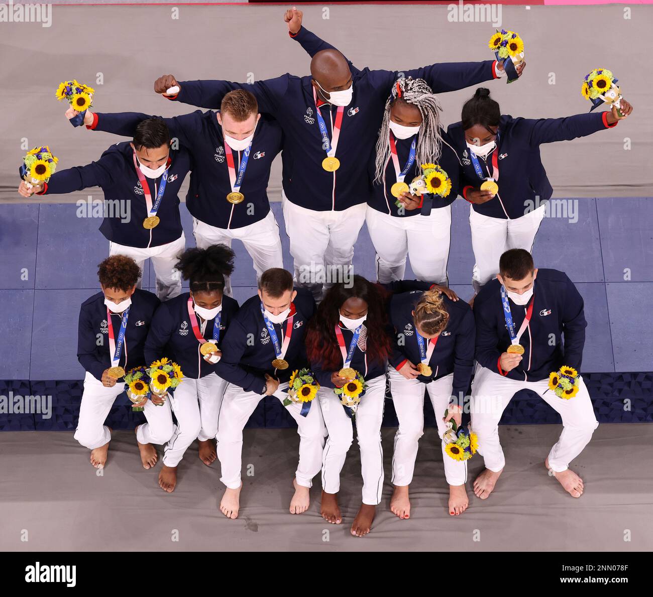 Members of France celebrate after winning Judo mixed team final match ...