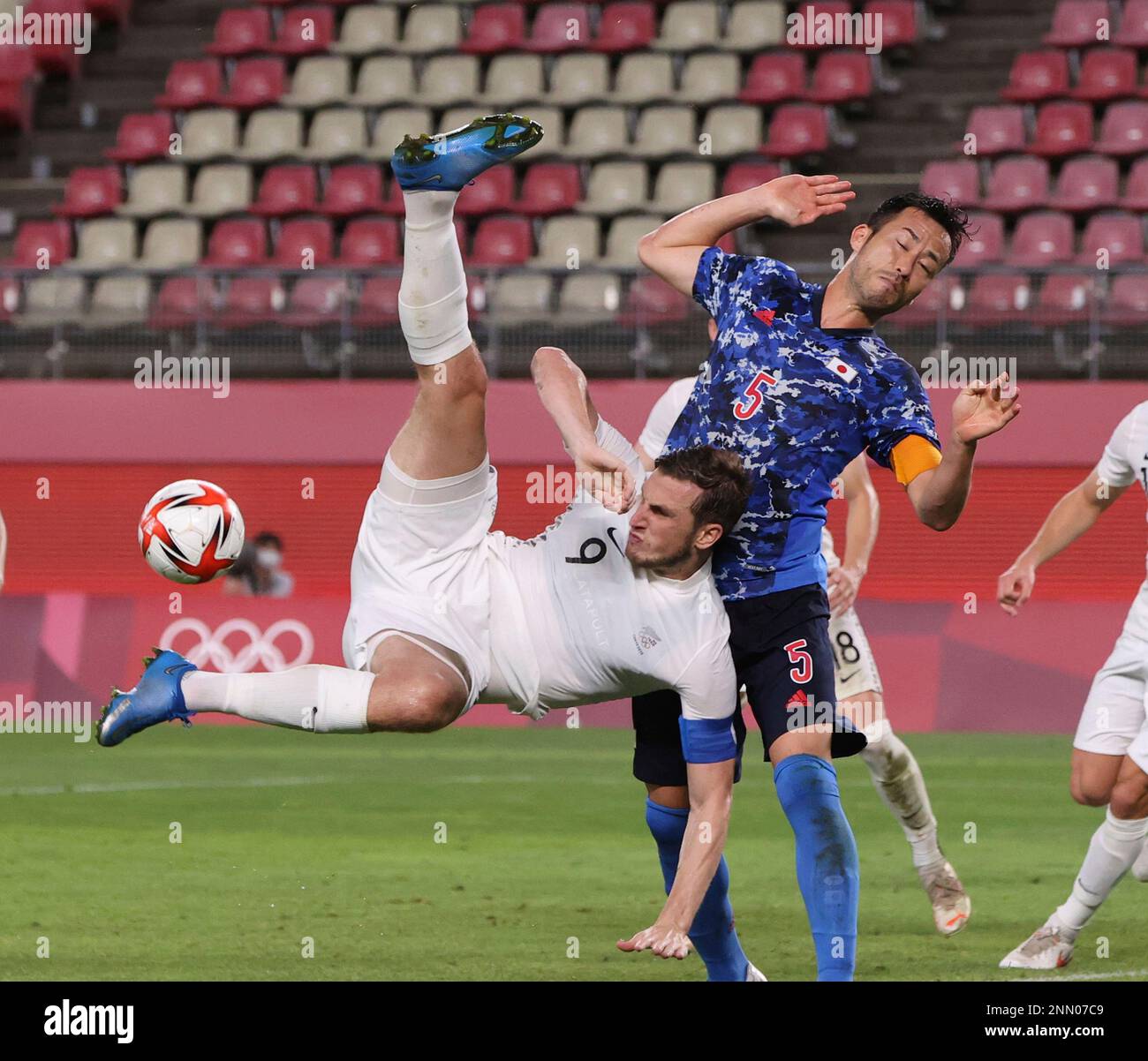 New Zealand's foward WOOD Chris (L,9) attempts a bicycle kick as Japan ...