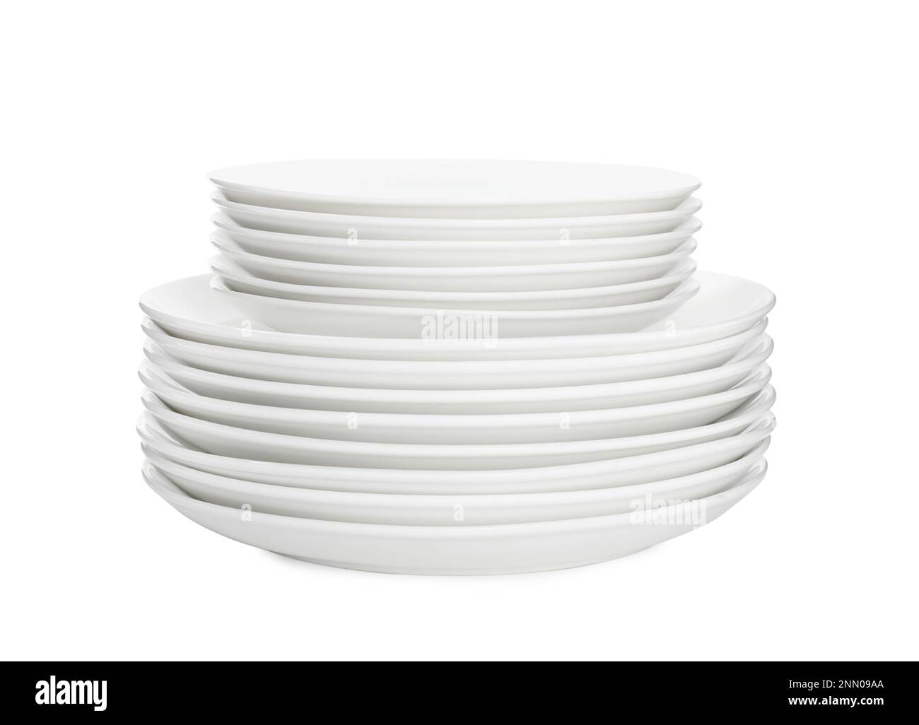 Stack of clean plates on white background Stock Photo - Alamy