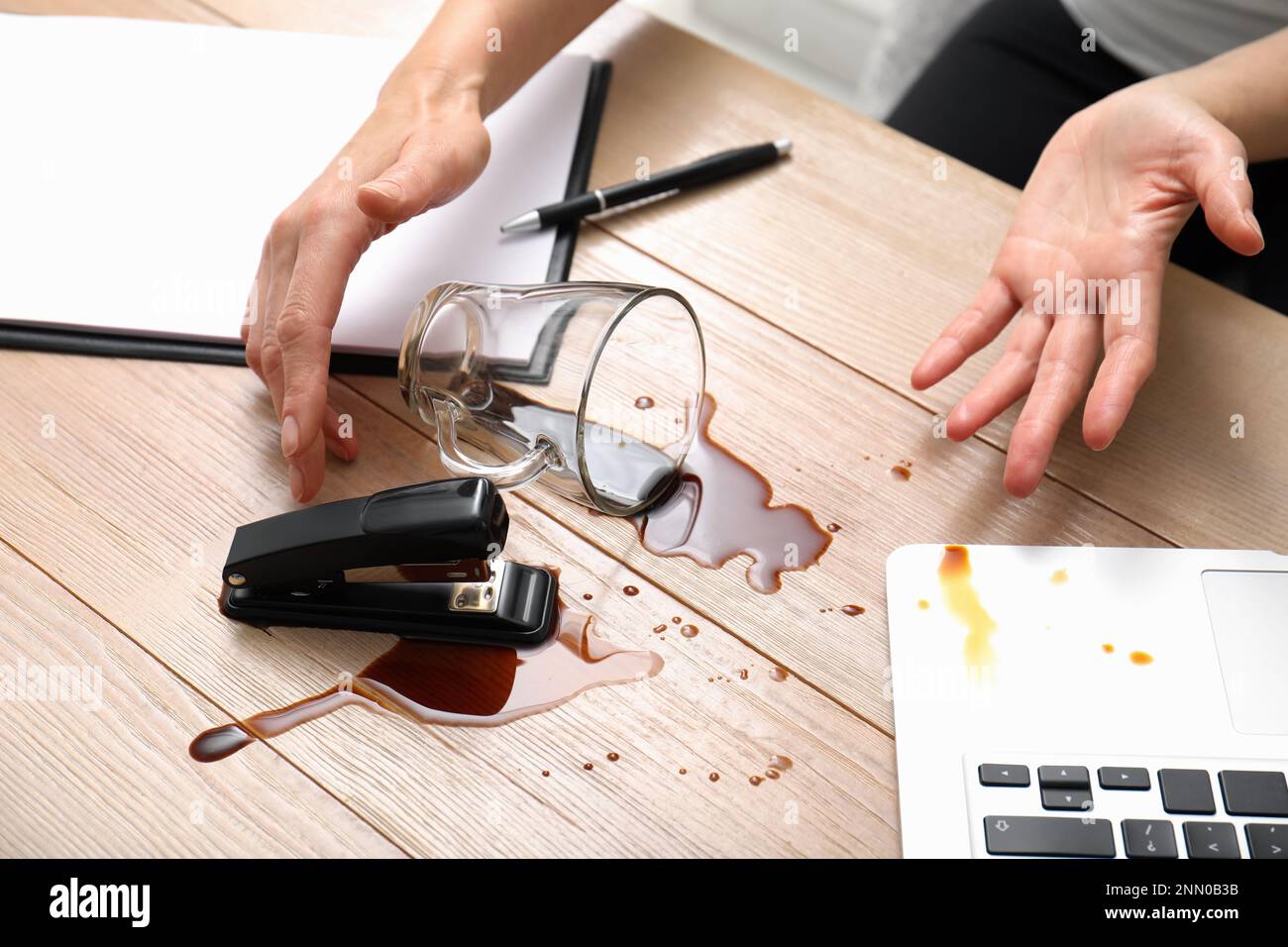 Spilt coffee woman hi-res stock photography and images - Alamy