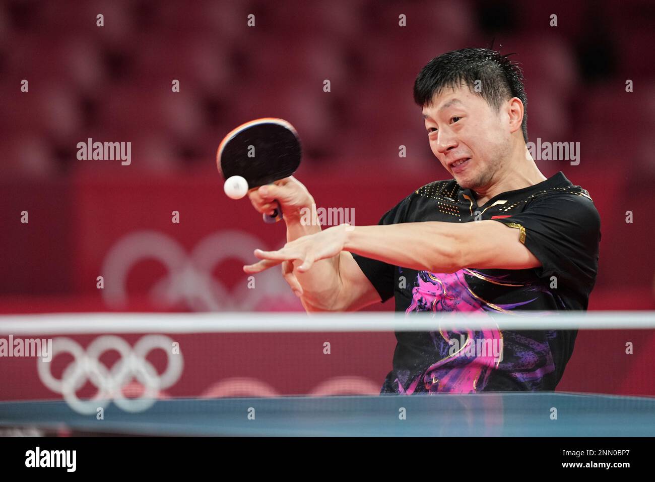 China's MA Long competes in the Final Match against FAN Zhendong at ...