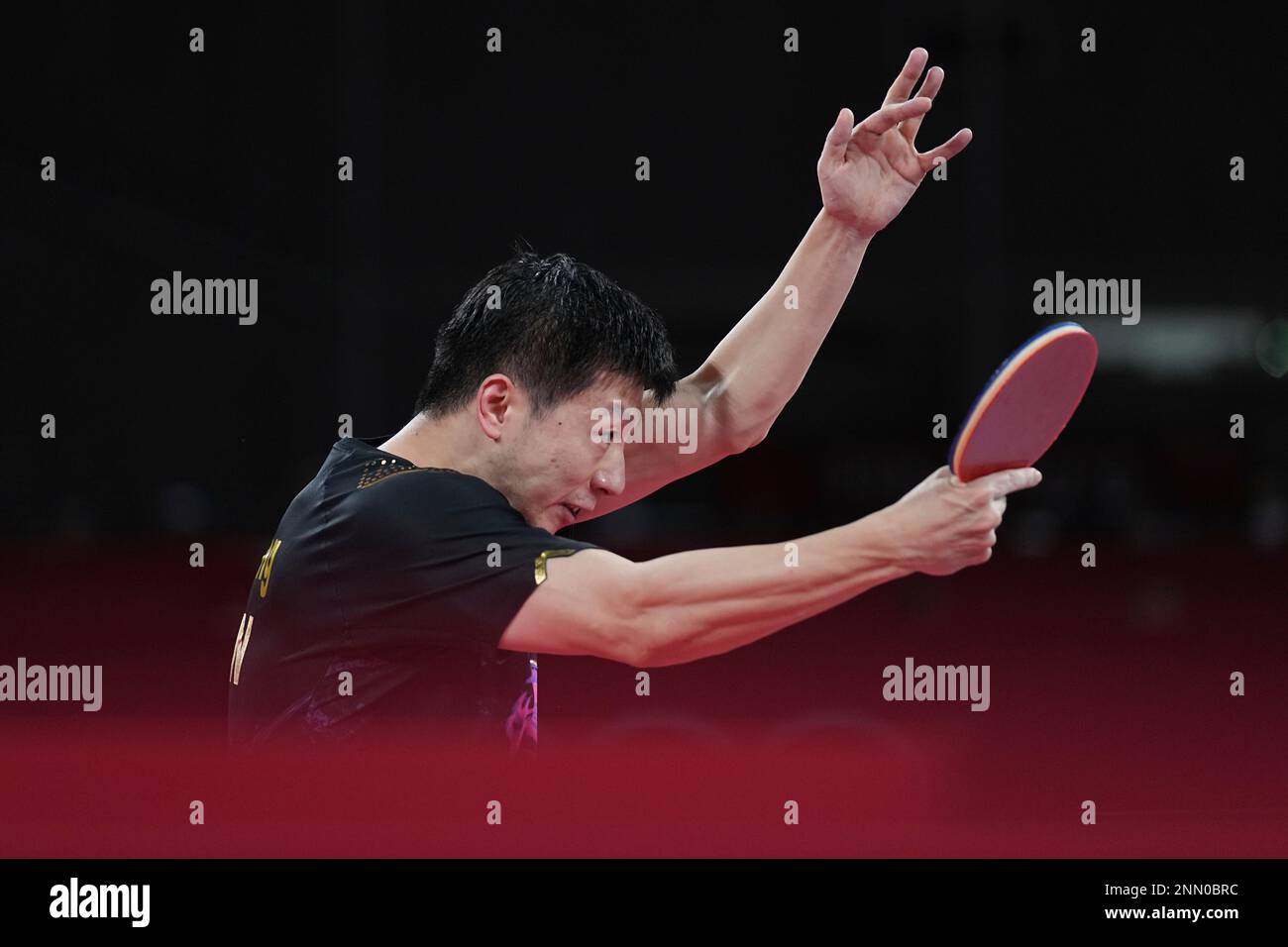 China's MA Long competes in the Final Match against FAN Zhendong at ...