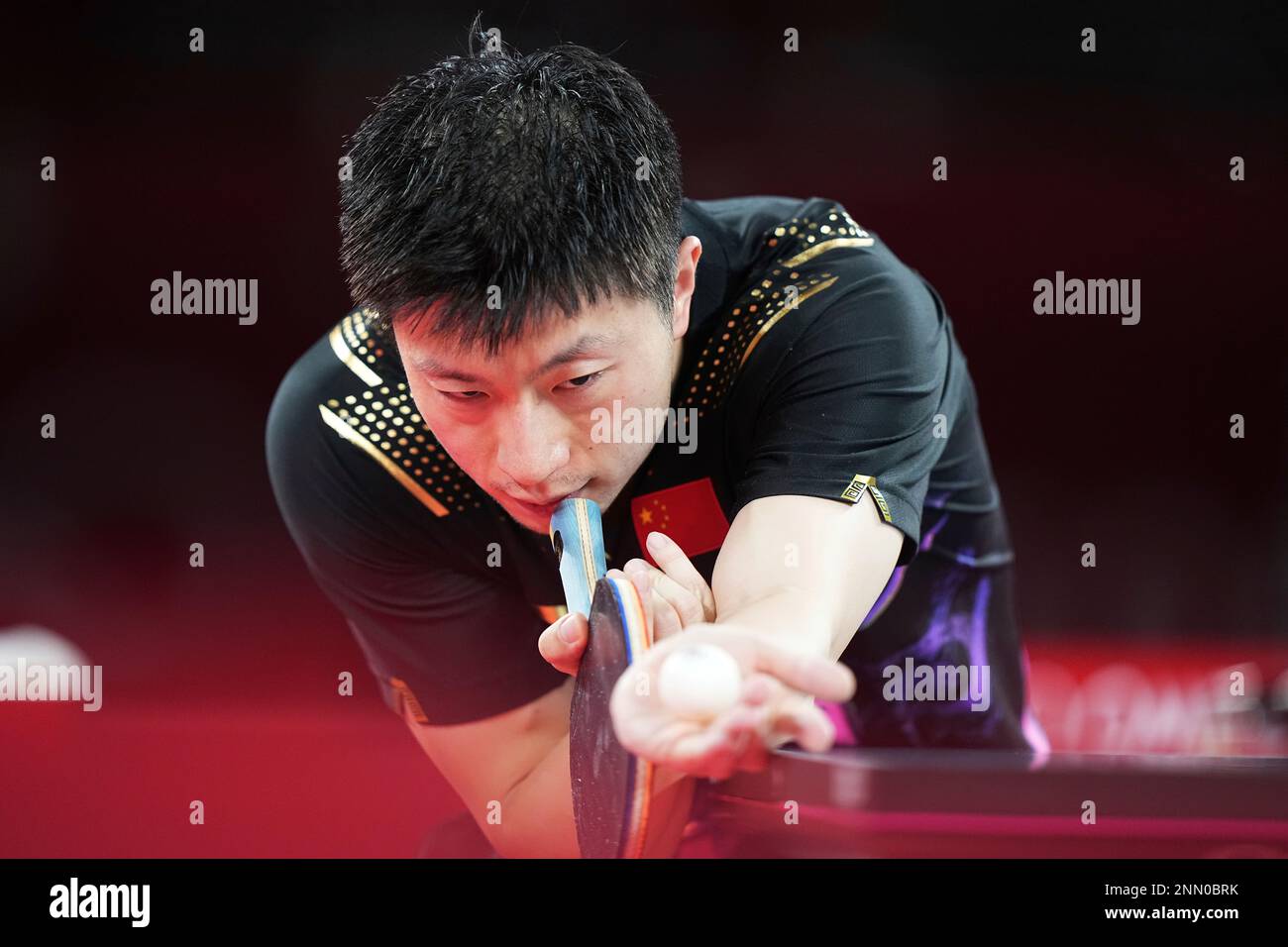 China's MA Long competes in the Final Match against FAN Zhendong at ...