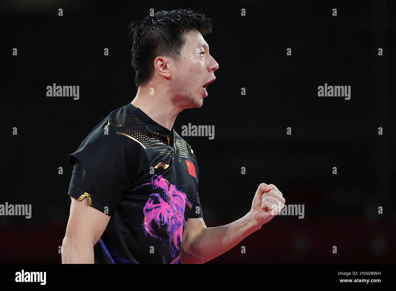 China's MA Long reacts during the Final Match against FAN Zhendong at ...