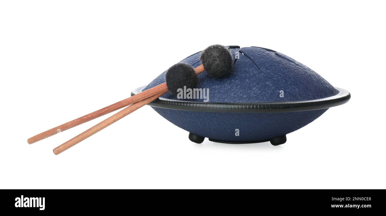 Steel tongue drum with soft mallets on white background. Percussion ...