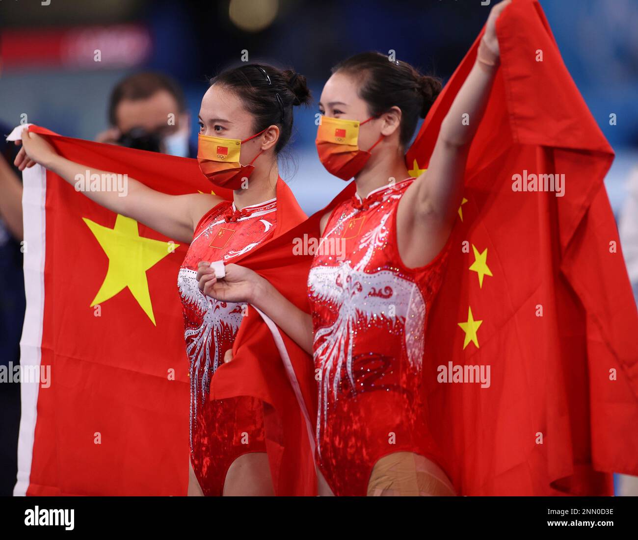 Chinese trampoline gymnast ZHU Xueying (L), gold, and LIU Lingling ...