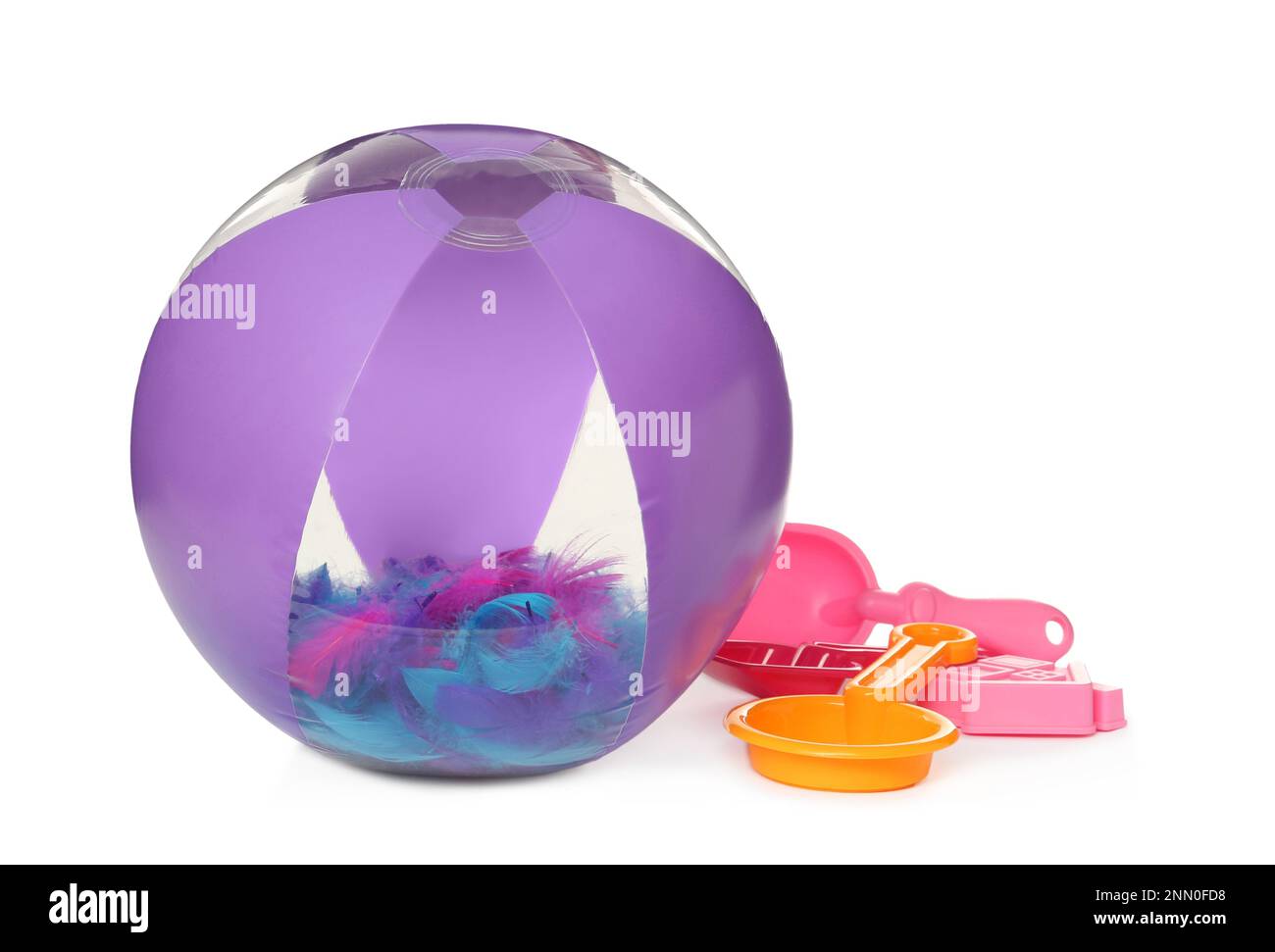 Inflatable beach ball and child plastic toys on white background Stock ...