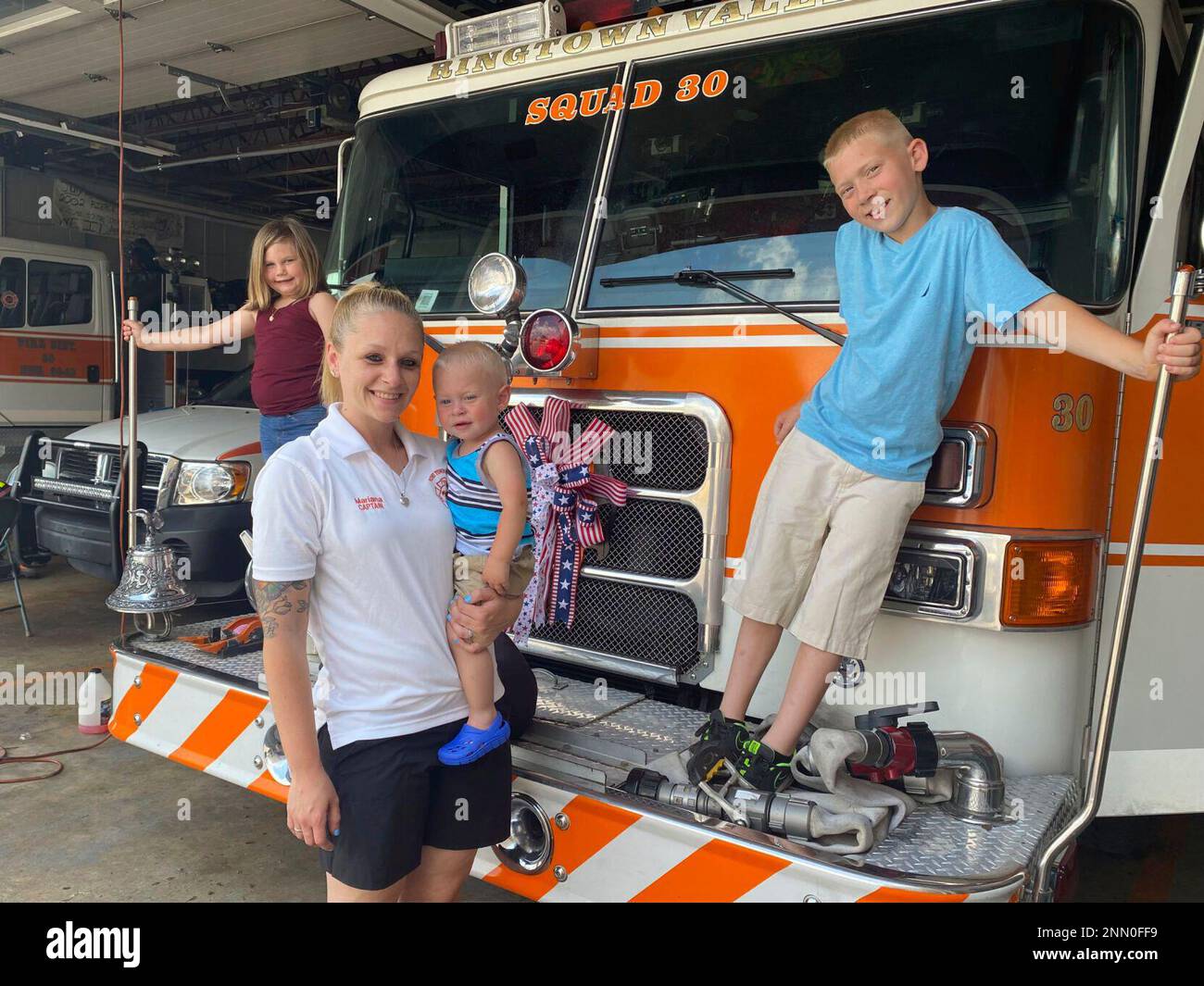 Mariana Gorski-Gilbert holding 1-year-old Cade; along with from left ...